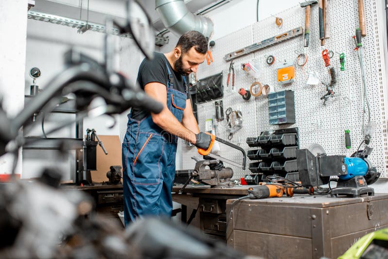 Handyman Working with Metal at the Workshop Stock Photo - Image of ...