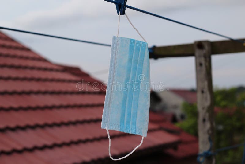 Hang the mask stock image. Image of covid, blue, mask - 214636245
