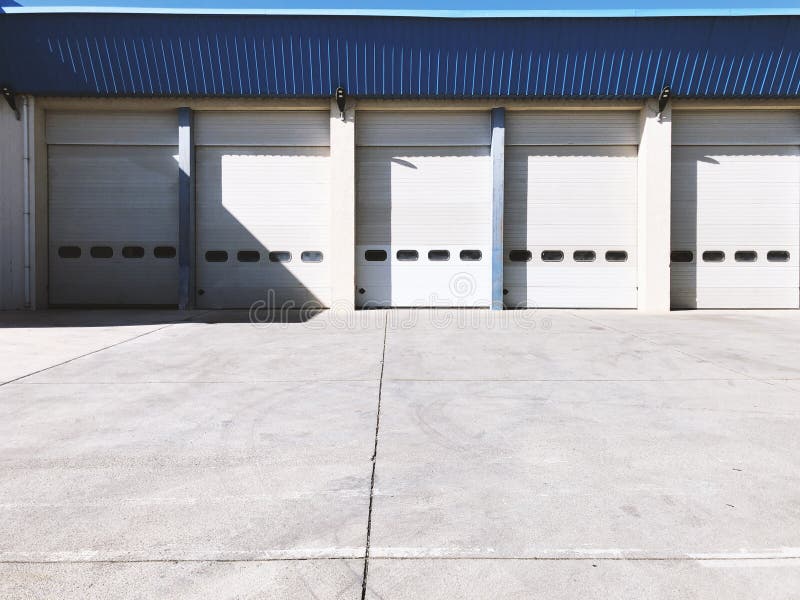 Hangar Gates with Blue Roof and Concrete Floor Stock Photo - Image of ...