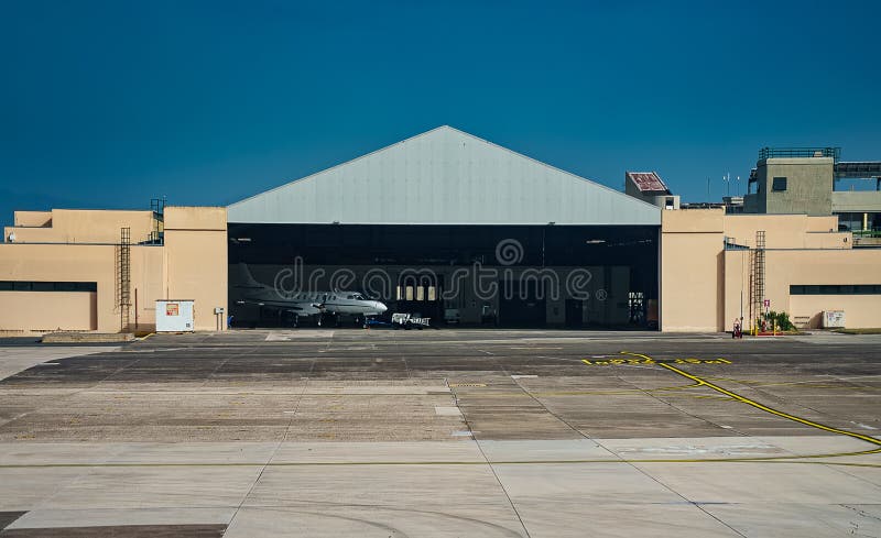 Hangar with a Small Private Jet Stock Image - Image of parked, fuselage ...