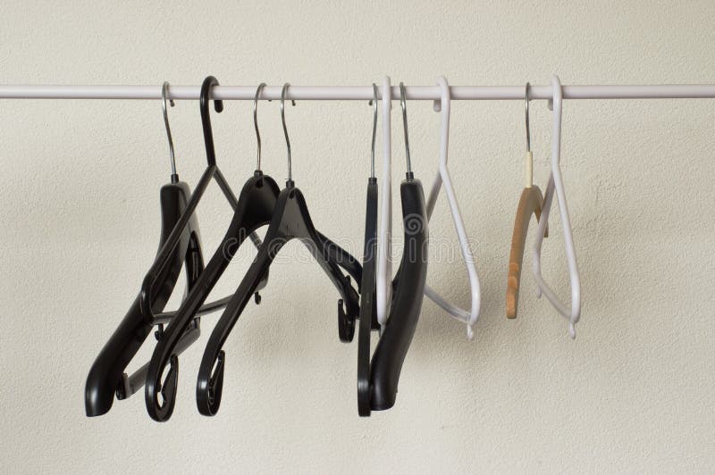 Hangers on rack stock image. Image of clothing, storage - 90563357