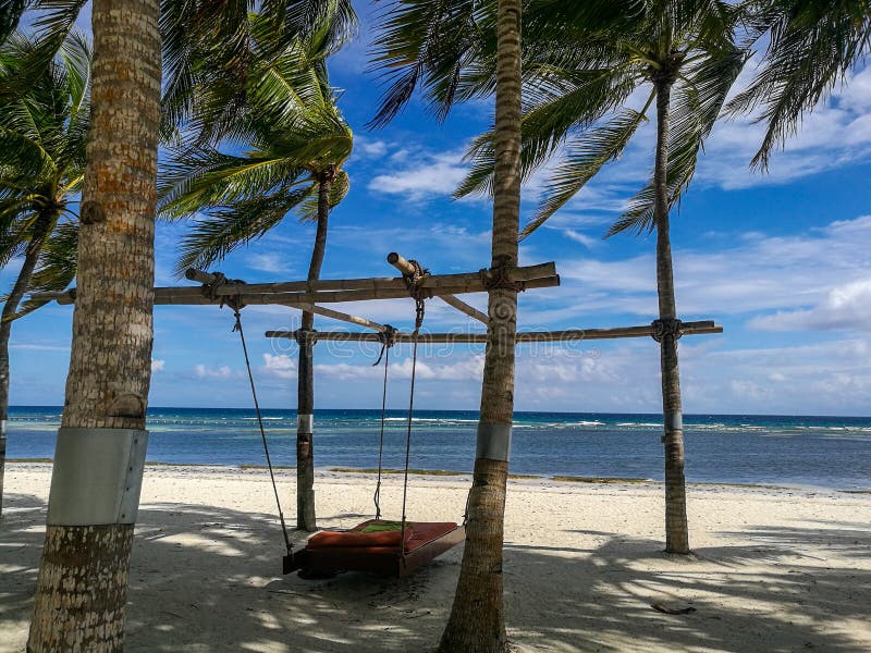 A Hanging Bed Invites To Relax in the Shadows of the Burning Sun on ...