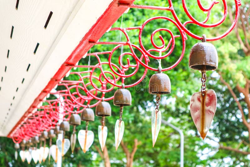 Hanging Bells on Red Wire Design and Water Drop of Rain Fall Stock ...