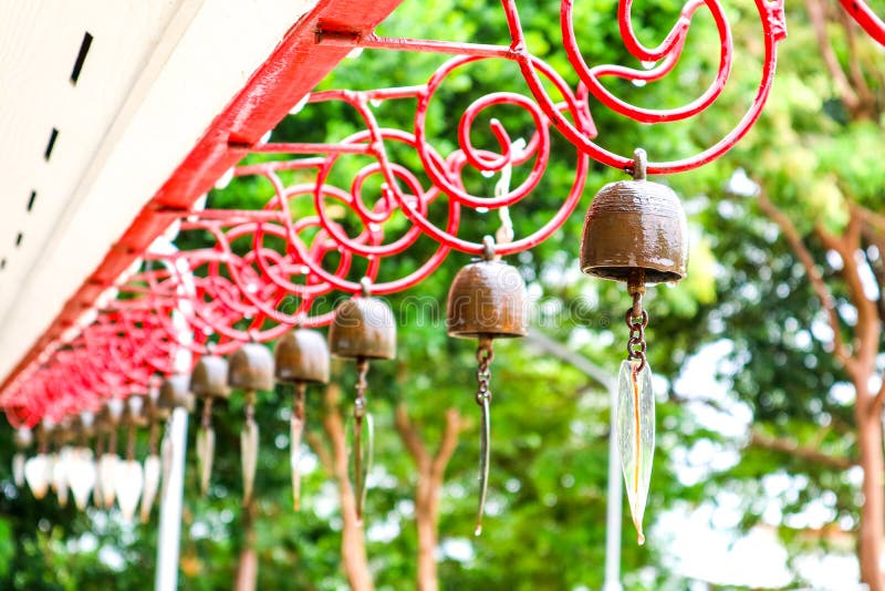 Hanging Bells on Red Wire Design and Water Drop of Rain Fall Stock ...