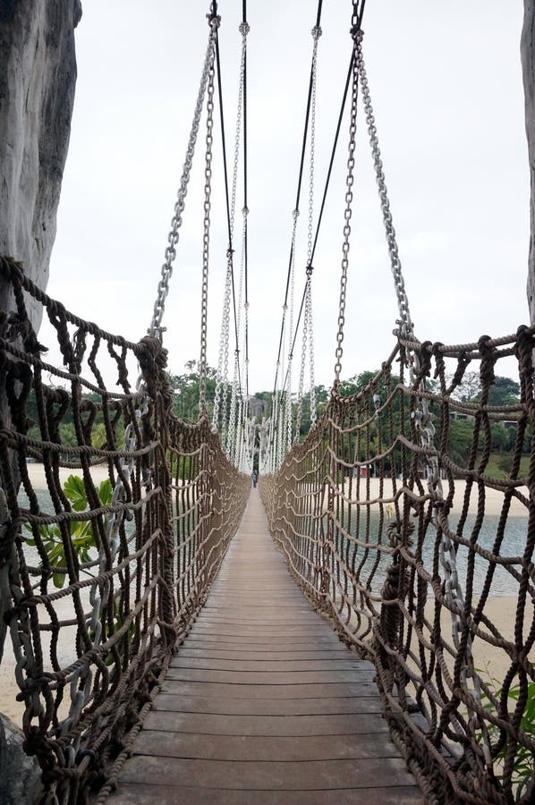 Hanging bridge in Sentosa stock image. Image of island - 89474141
