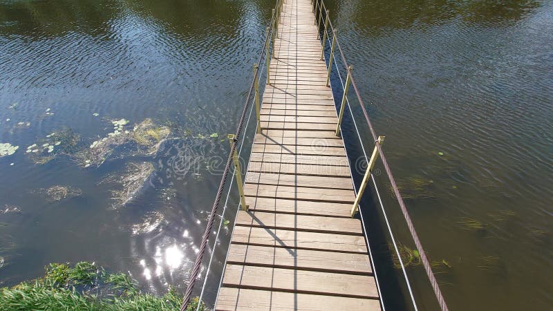 Simple Suspension Footbridge Over Mountain Valley Stock Photo - Image ...
