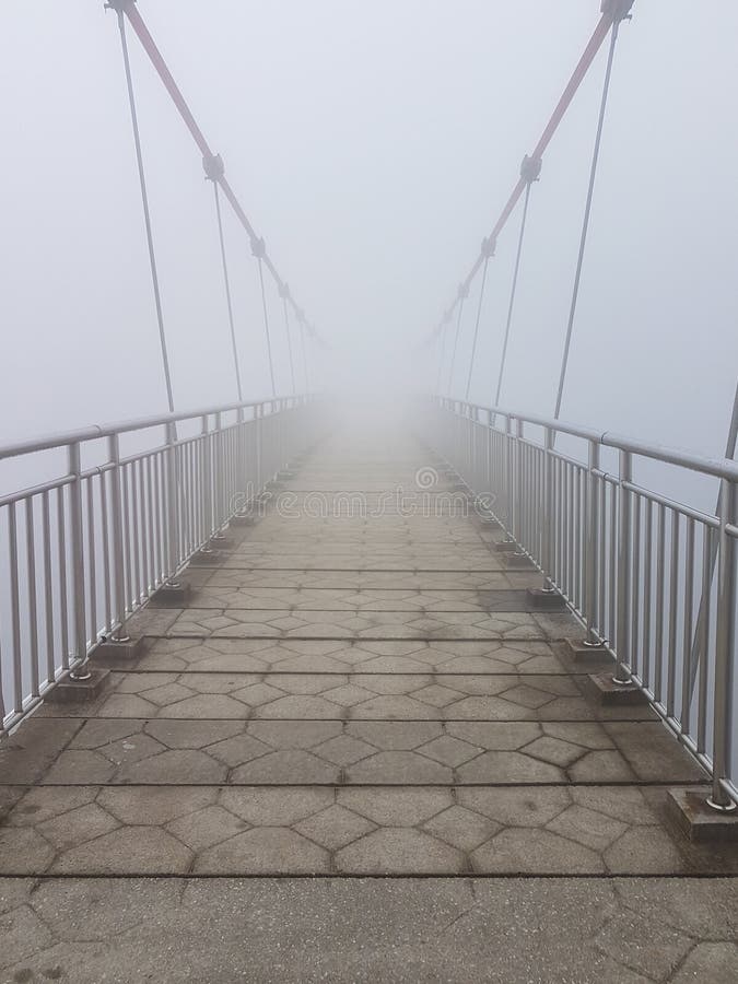Hanging Bridge Vanishing in Fog Stock Image - Image of landscape, huge ...