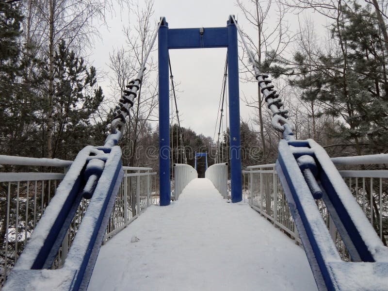 Hanging Cable Footbridge Over the River in the Snow Stock Image - Image ...