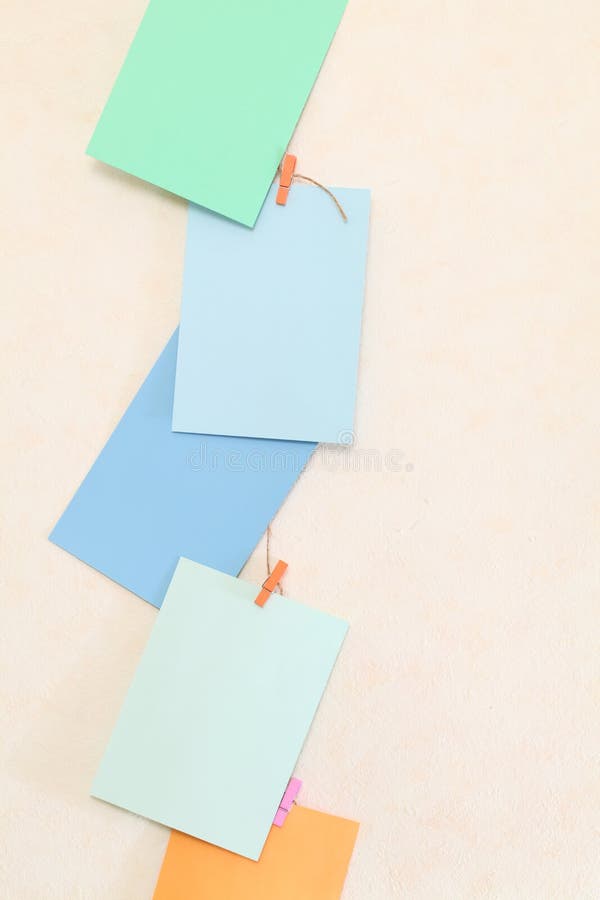 Hanging colorful paper stock image. Image of announcement - 25568597