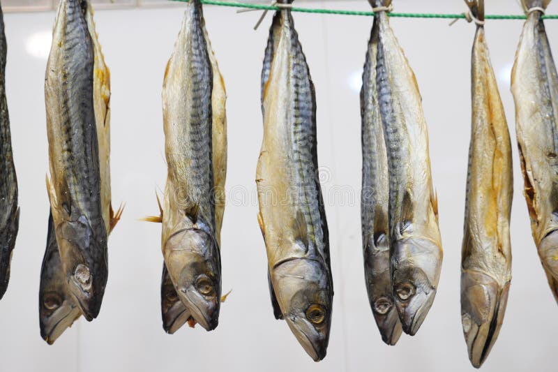 Hanging Dried Fish Displayed at a Local Market in Summer Stock Photo ...