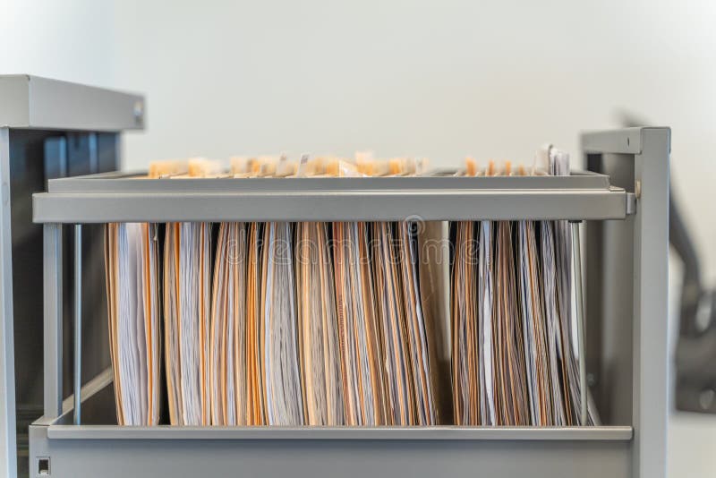 Hanging Files in Filling Cabinet in an Office at Work Stock Photo ...