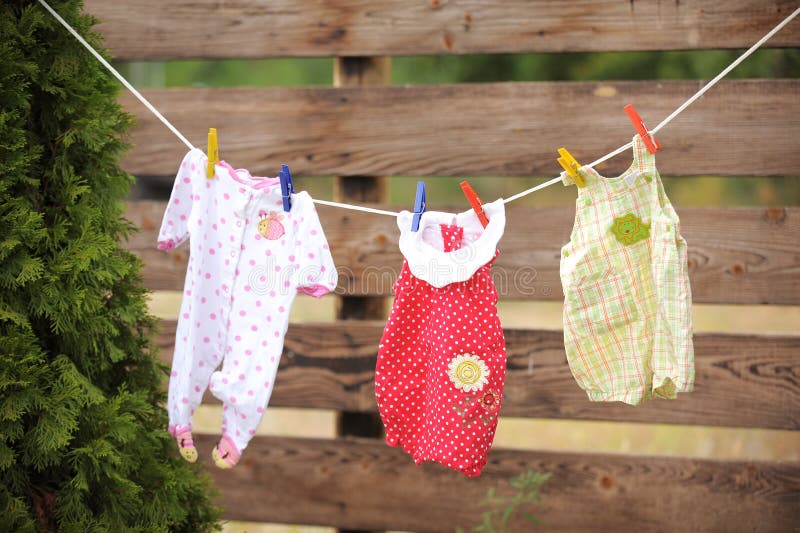 Hanging Girl s Clothes stock image. Image of pair, fashion - 50601833