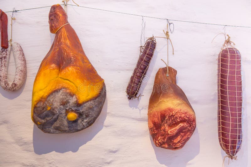 Hanging ham and meat stock image. Image of wall, bone - 64747145