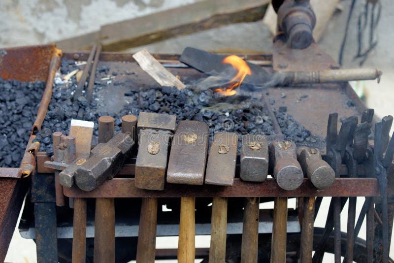 Hanging Hammers at the Forge Cart from a Blacksmith Stock Photo - Image ...