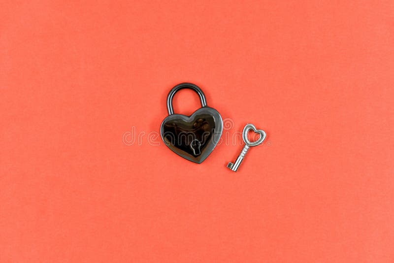 Hanging Heart-shaped Lock and Key on Red Paper Background Stock Image ...