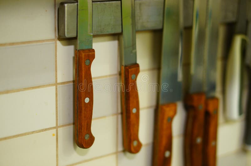 Hanging knives stock image. Image of kitchen, wood, knives - 48912285