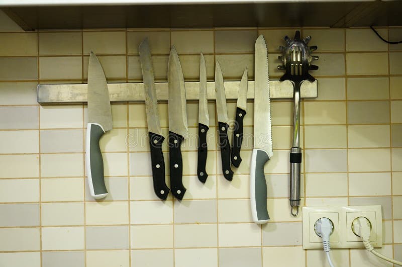 Hanging knives stock photo. Image of knives, wall, tools - 48700218