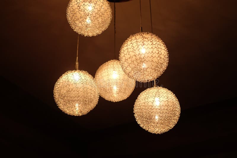 A Hanging Lamp is Designed in a Round Stock Image - Image of bakery ...