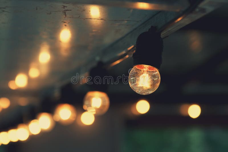 Hanging light bulb indoor stock image. Image of design - 138365581