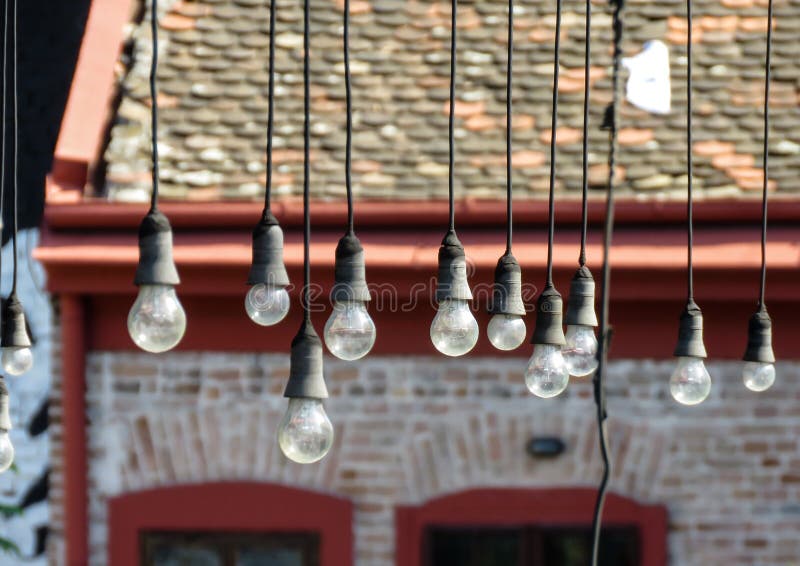 Hanging light bulbs stock photo. Image of hanging, cables - 126817236