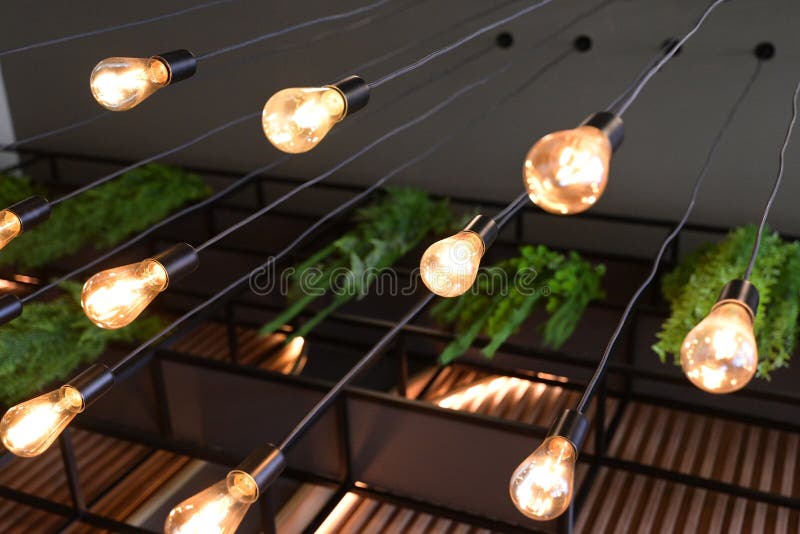 Hanging Light Bulbs in Modern Interior Stock Image - Image of ...