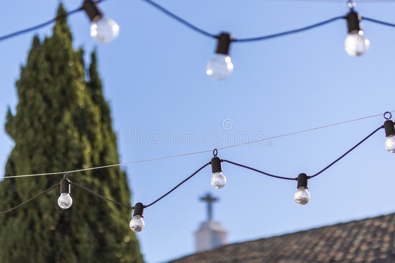 Hanging Lightbulbs with Wire Stock Image - Image of people, mood: 268193293