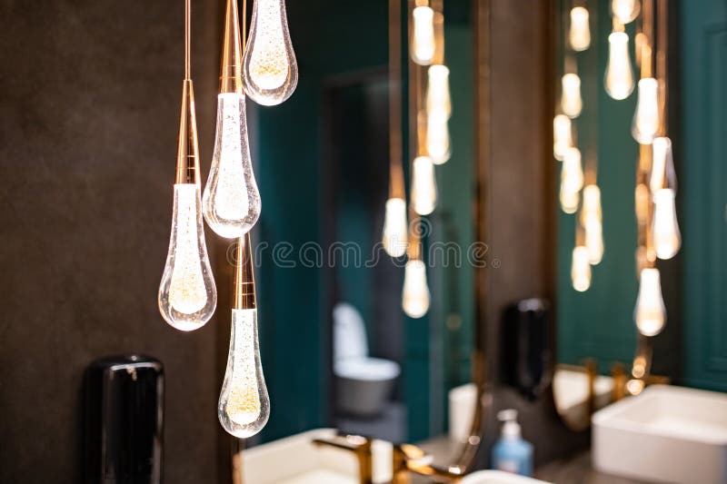 Hanging Lighting in a Luxury Public Bathroom with Mirrors Stock Image ...