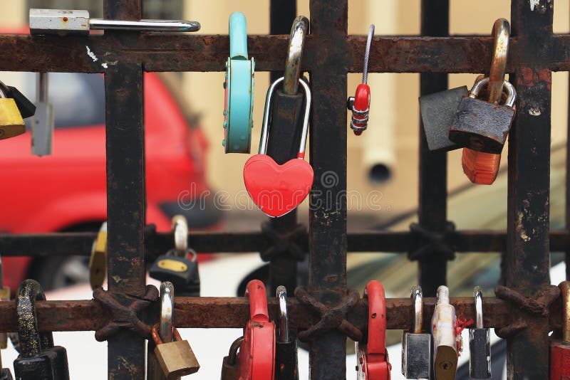 Hanging locks on a fence stock photo. Image of couple - 117082588