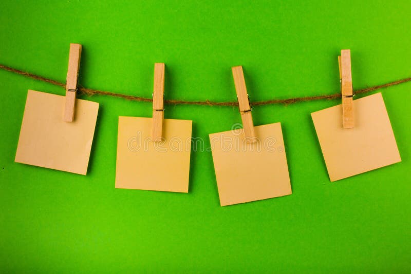 Four Sticky Notes Hanging on Twine Attached with Stock Image - Image of ...