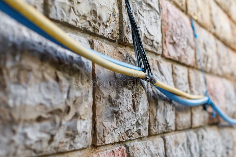 Hanging Old Network Electrical Cables on Wall Outdoors Stock Image ...