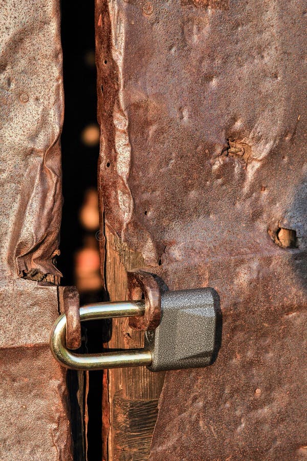 Hanging Padlock on the Old Rusty Door Stock Photo - Image of door ...