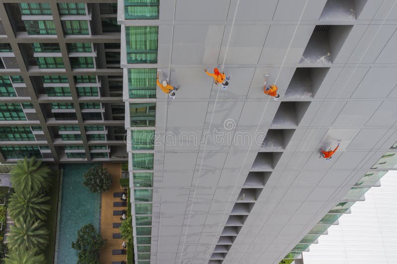 Hanging Painters is Painting High Building Stock Image - Image of high ...