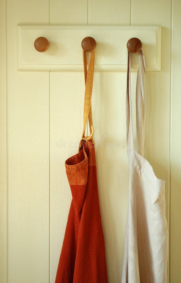 Hanging pair of Aprons stock image. Image of clean, cooking - 4879993