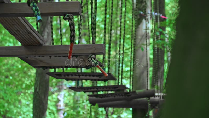 Hanging Plank Bridge Obstacle in Rope Park Stock Video - Video of ...