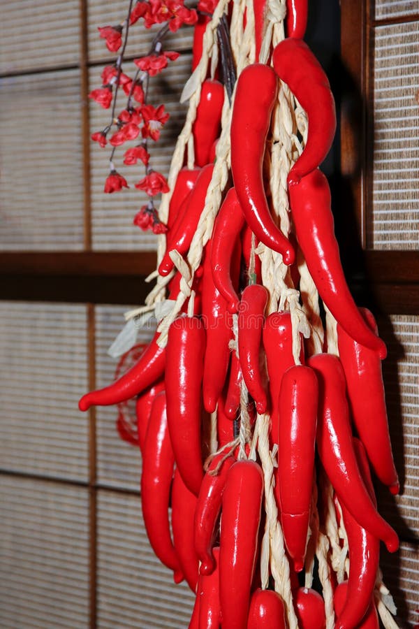 Hanging red chili peppers stock photo. Image of decoration - 254820764