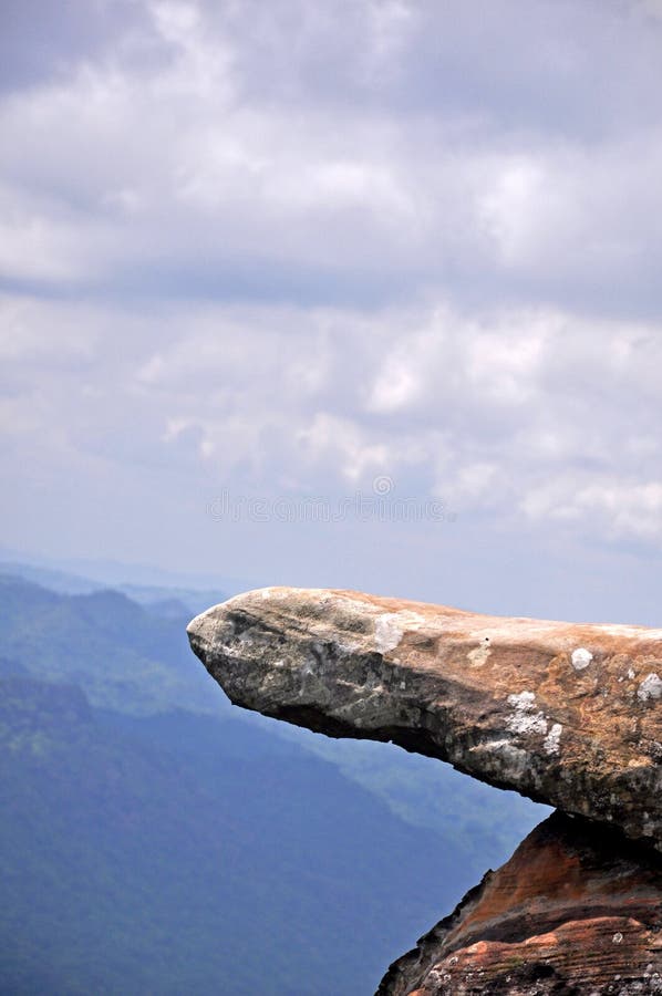 Hanging Rock Jutting Out Of The Cliff(head To Sky) Stock Image - Image ...