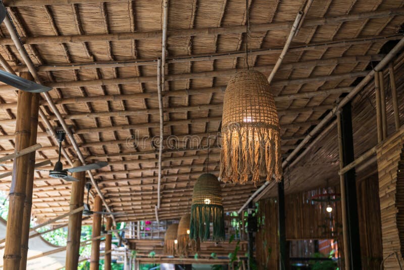 Hanging Rope Lamp with Light Bulb on Wooden Ceiling in Cafe Stock Photo ...