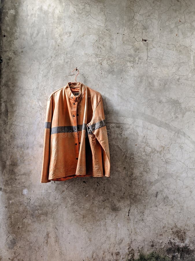 Hanging Shabby Jacket with Brown or Orange Colour Stock Photo - Image ...