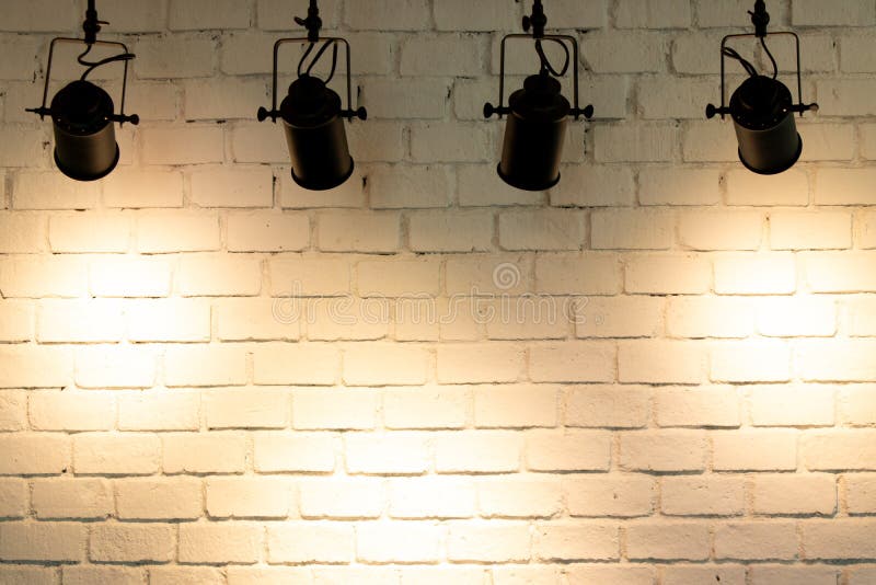 Hanging Spotlight Illuminate at Brick Wall Background Stock Image ...