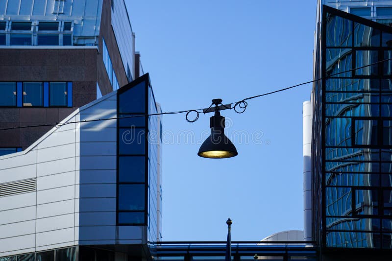 A Hanging Street Lamp in City Stock Photo - Image of city, outdoor ...