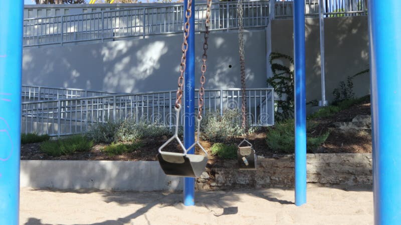 Hanging Swing for Children at a Playground Stock Video - Video of ...