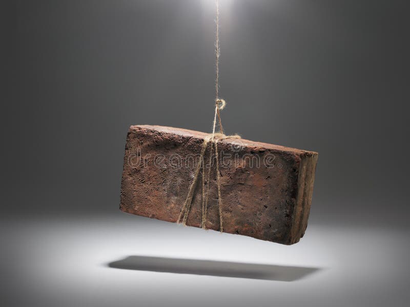 Hanging by a thread stock photo. Image of brick, barely - 40108040