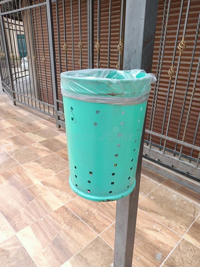 Hanging trash can stock photo. Image of iron, wood, water - 245703332