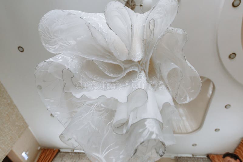Hanging White Wedding Dress. Bottom View Stock Photo - Image of ...