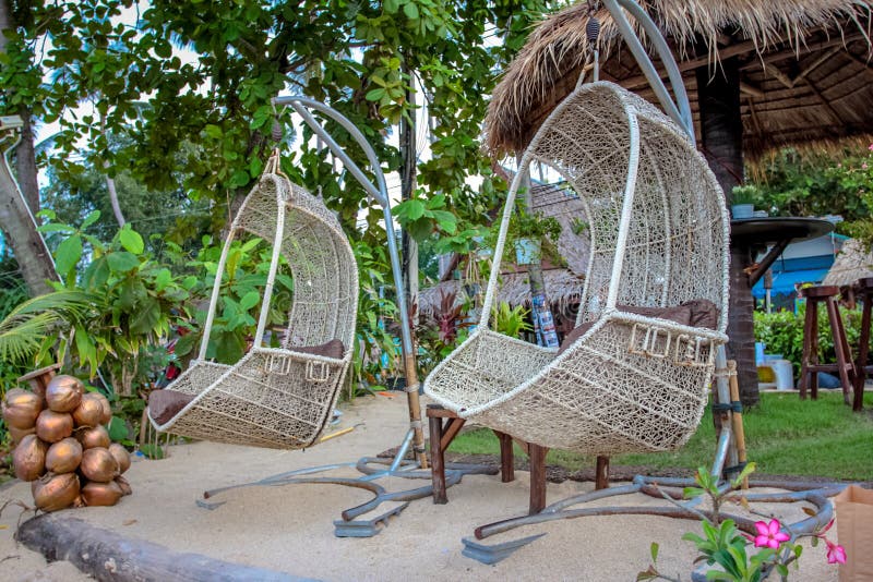 Hanging wicker chairs stock image. Image of brown, grass - 36514143