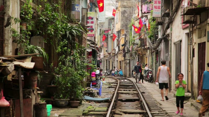 HANOI,VIETNAM - MAY 2014: Train Passing through Slums Stock Video ...