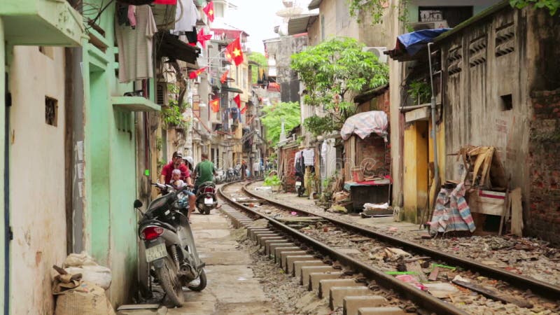 HANOI,VIETNAM - MAY 2014: Train Passing through Slums Stock Video ...