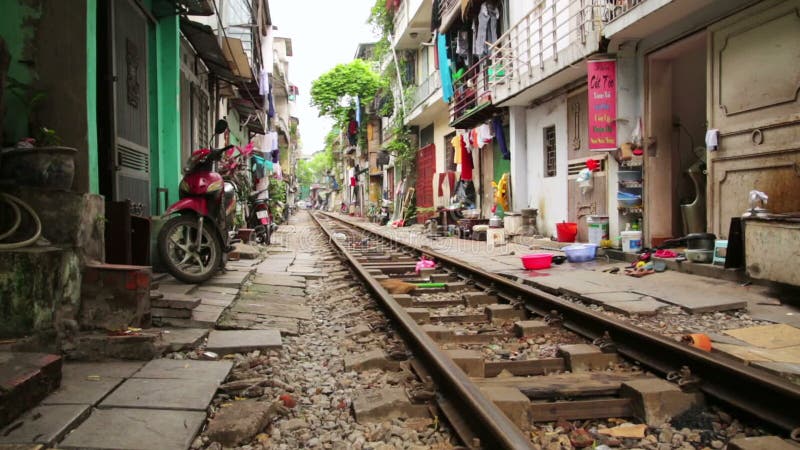 HANOI,VIETNAM - MAY 2014: Train Passing through Slums Stock Footage ...