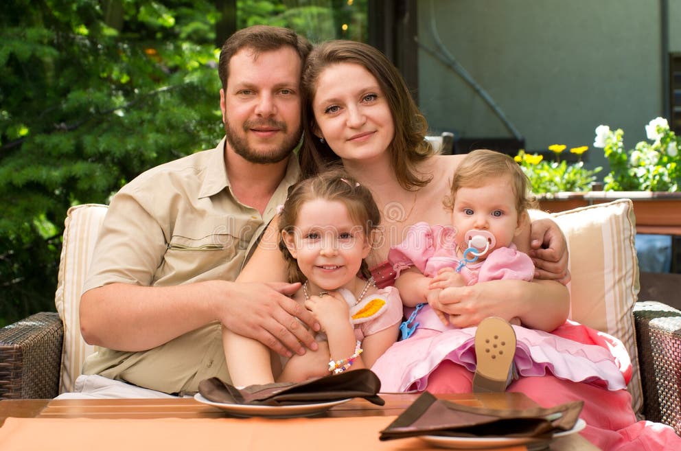 Haooy family stock image. Image of beauty, sitting, family - 25693019