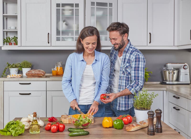 Happily Married Couple Cooking Stock Image - Image of counter, domestic ...